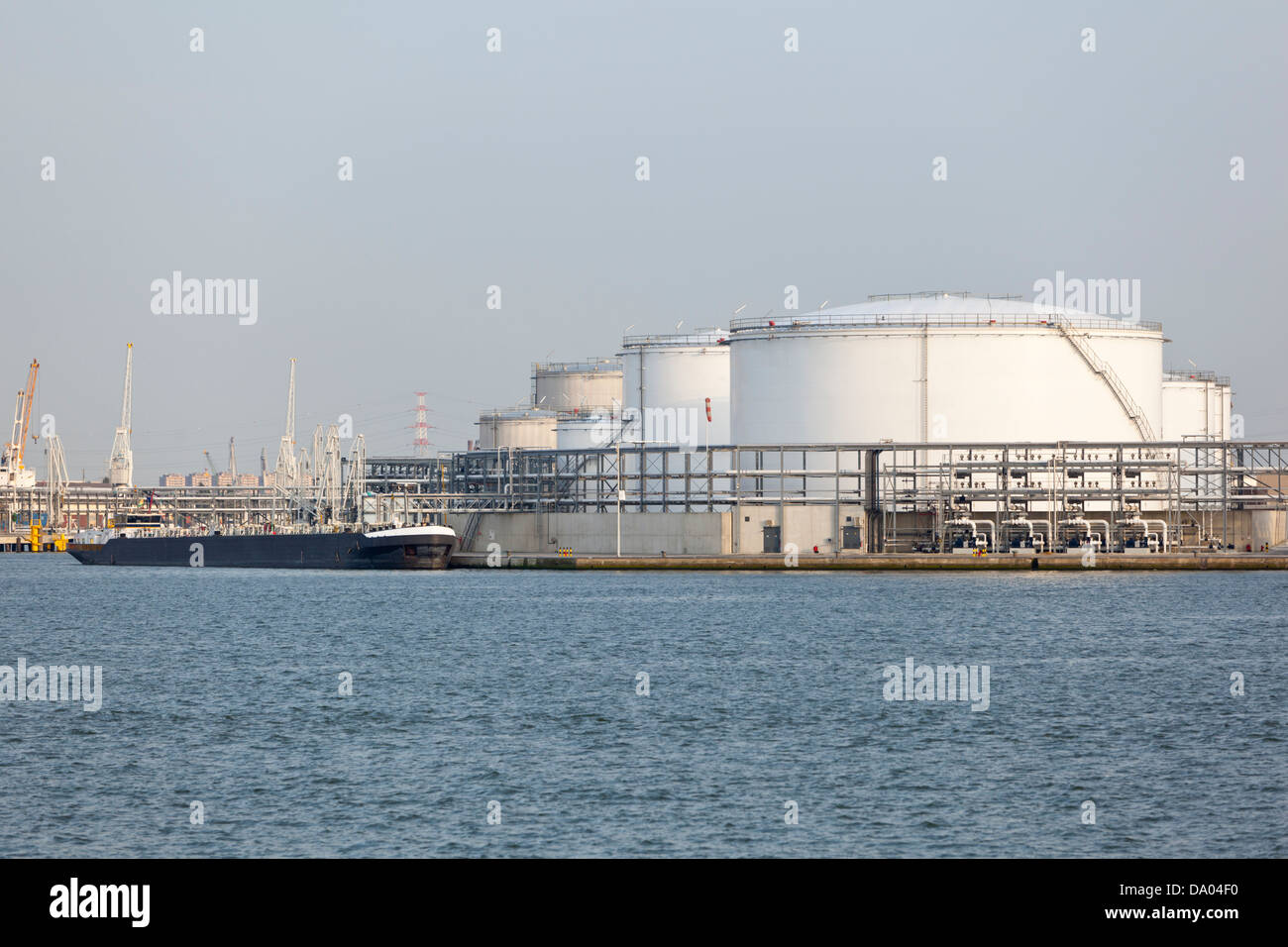Oil harbor and refinery during daytime Stock Photo - Alamy