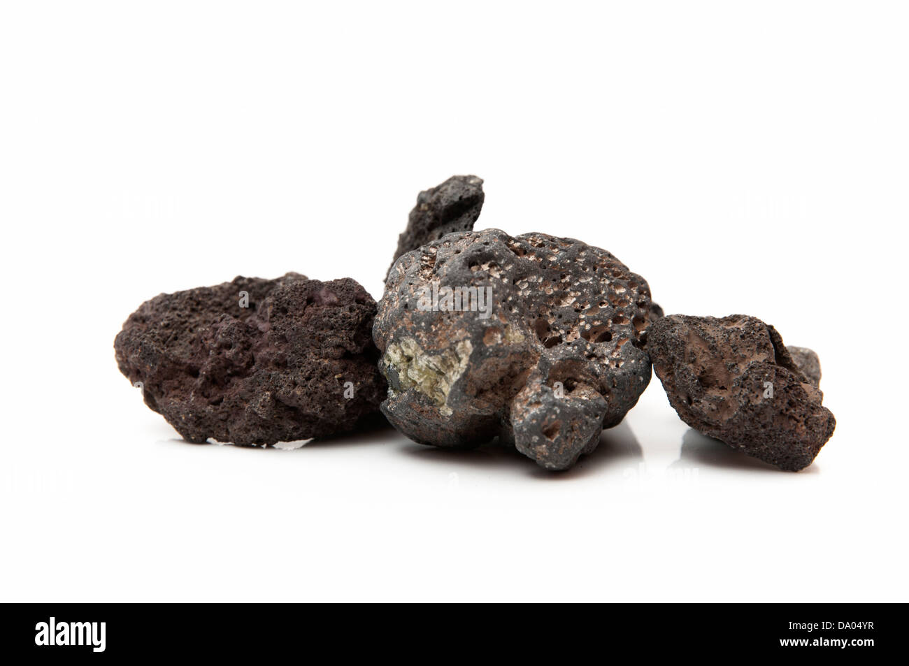 Volcanic stones on a white background Stock Photo - Alamy
