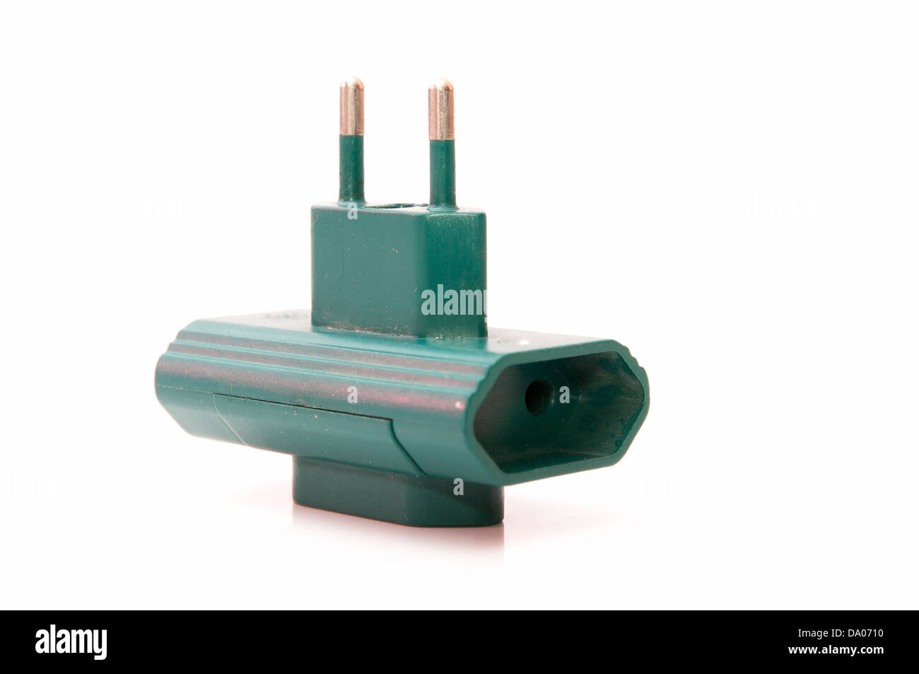 green plug on a white background Stock Photo - Alamy