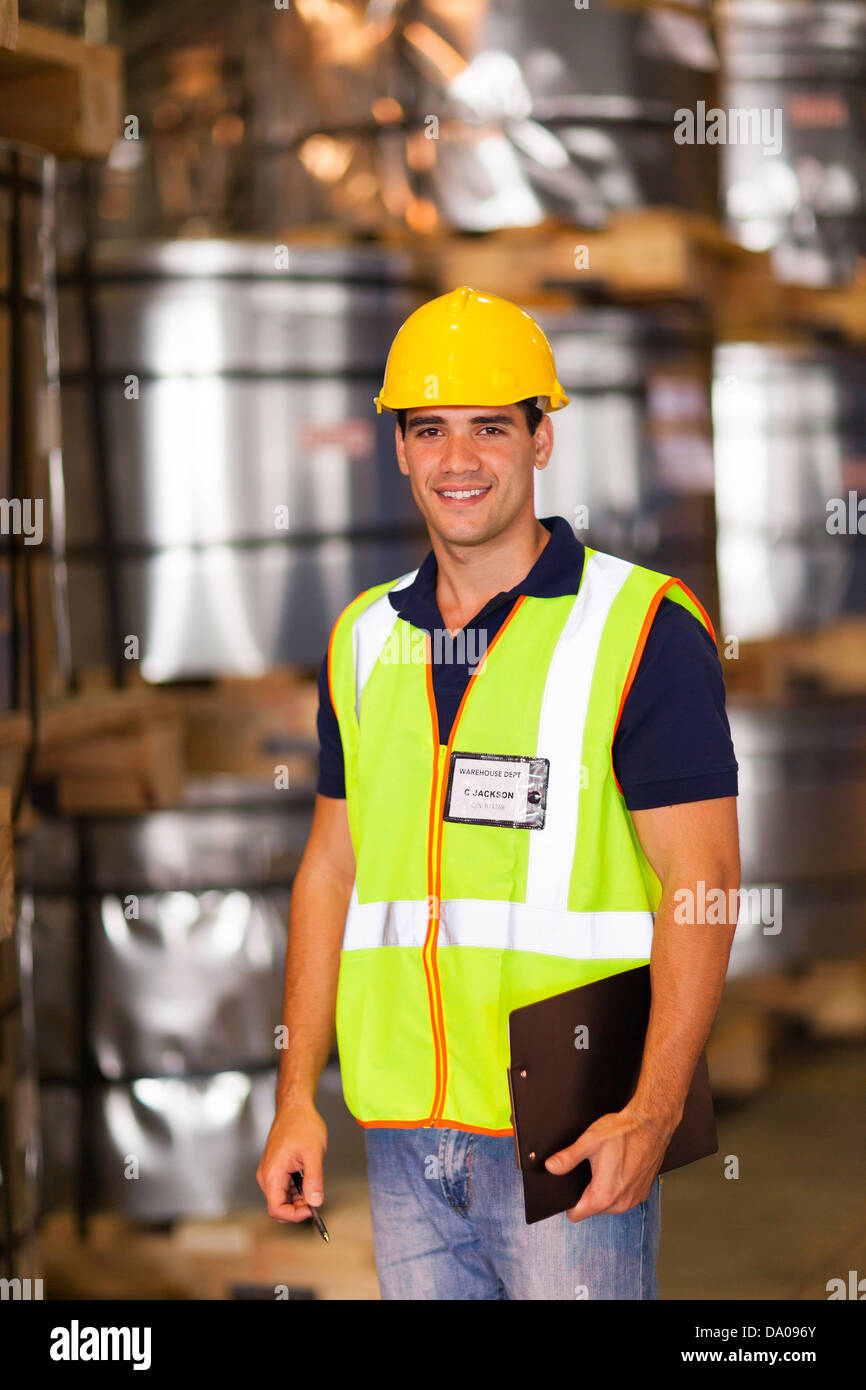handsome young warehouse worker inside storage Stock Photo - Alamy