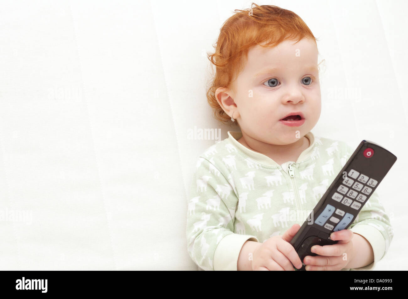 Small girl with remote control hi-res stock photography and images - Alamy