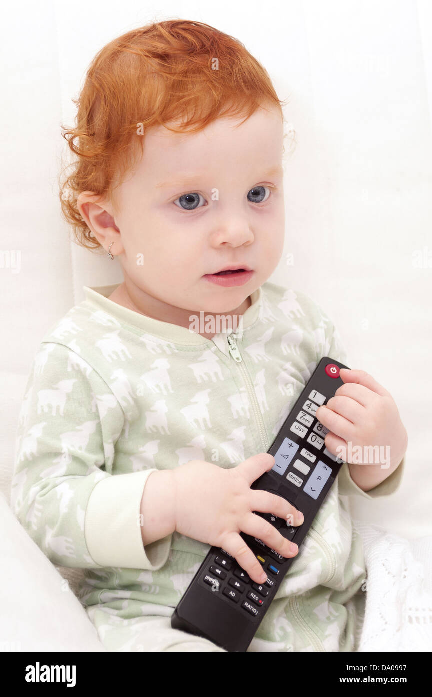 Small girl with remote control hi-res stock photography and images - Alamy