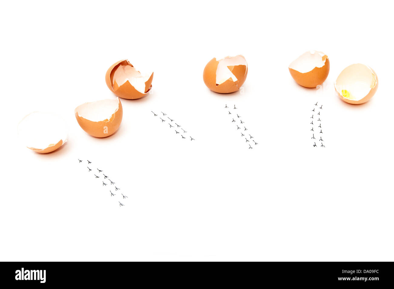 scrambled eggs with footprints on a white background Stock Photo - Alamy