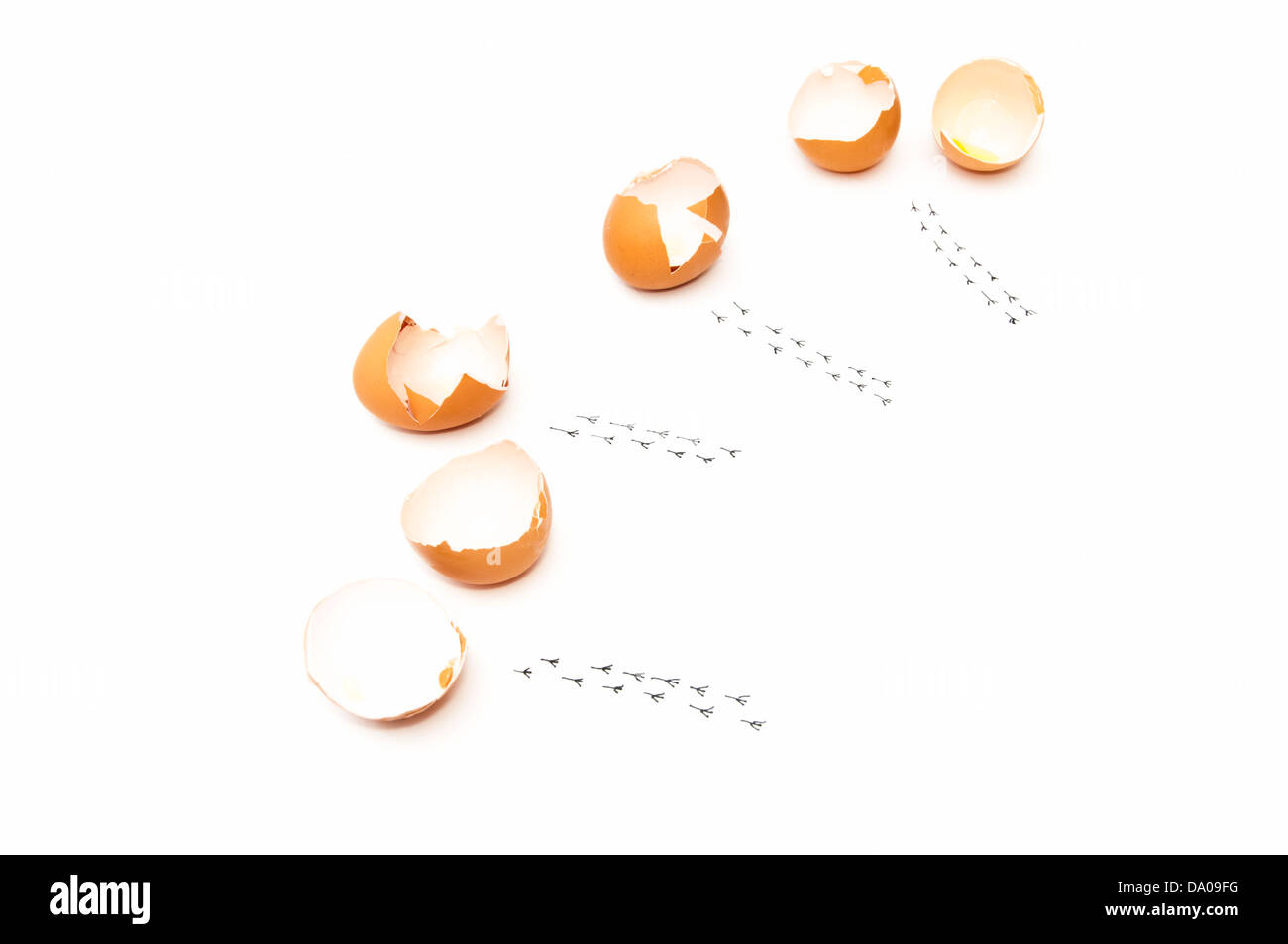 scrambled eggs with footprints on a white background Stock Photo - Alamy