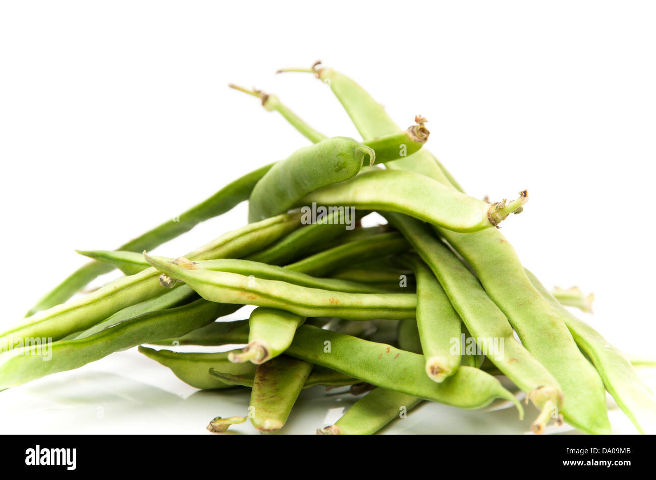 green beans on a white background Stock Photo - Alamy