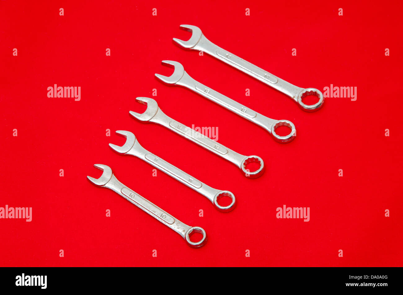 industrial tools on a red background Stock Photo - Alamy