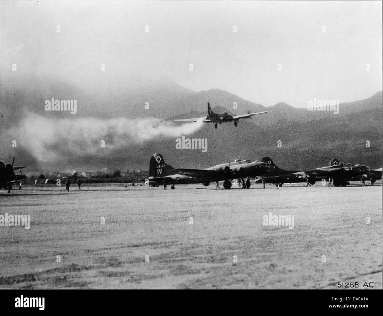A B-17 Flying Fortress from the 99th Bomb Group makes an emergency ...