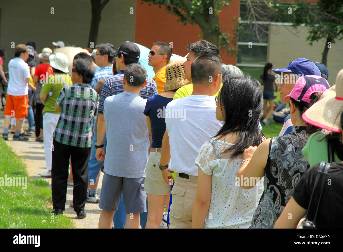 People Lining up Stock Photo - Alamy