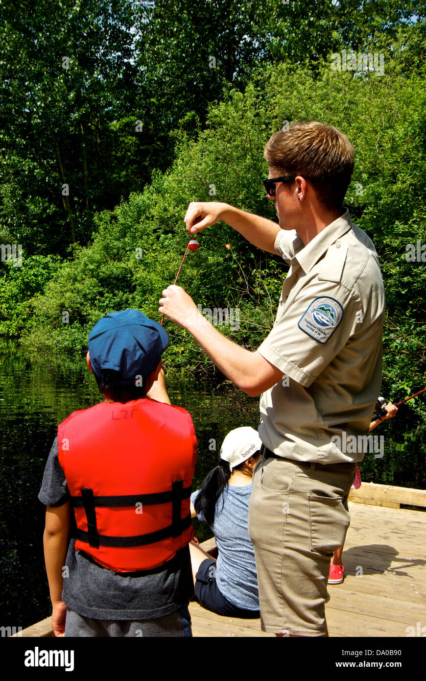Boy fish fishing hi-res stock photography and images - Alamy