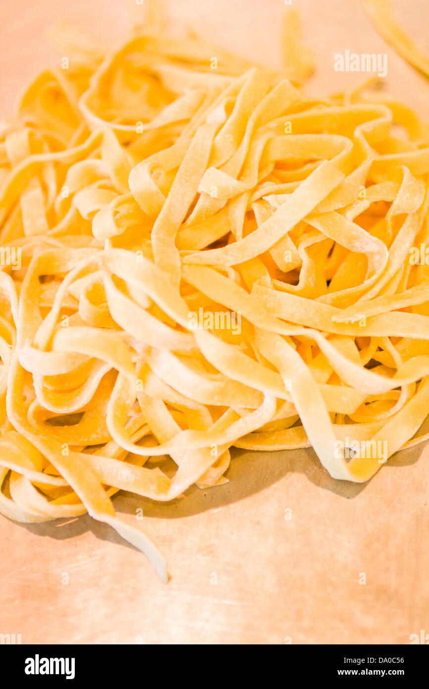 Learning how to make fresh spaghetti from scratch Stock Photo - Alamy