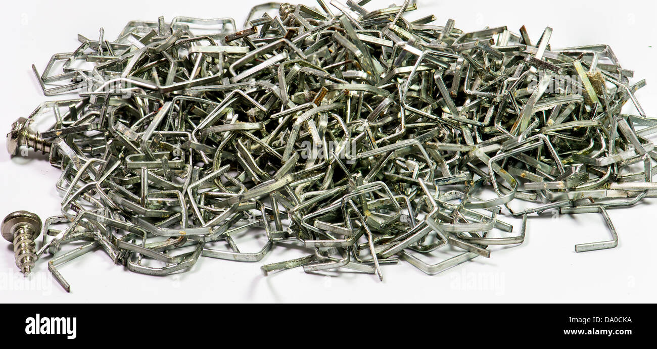 Used staples removed from a canvas painting Stock Photo - Alamy