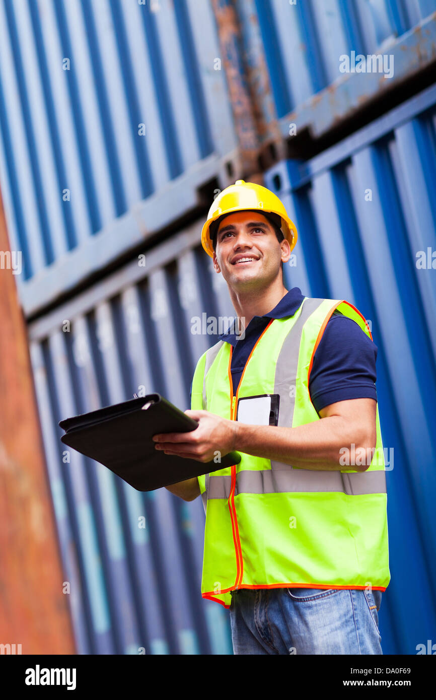 handsome young harbor container depot worker Stock Photo - Alamy