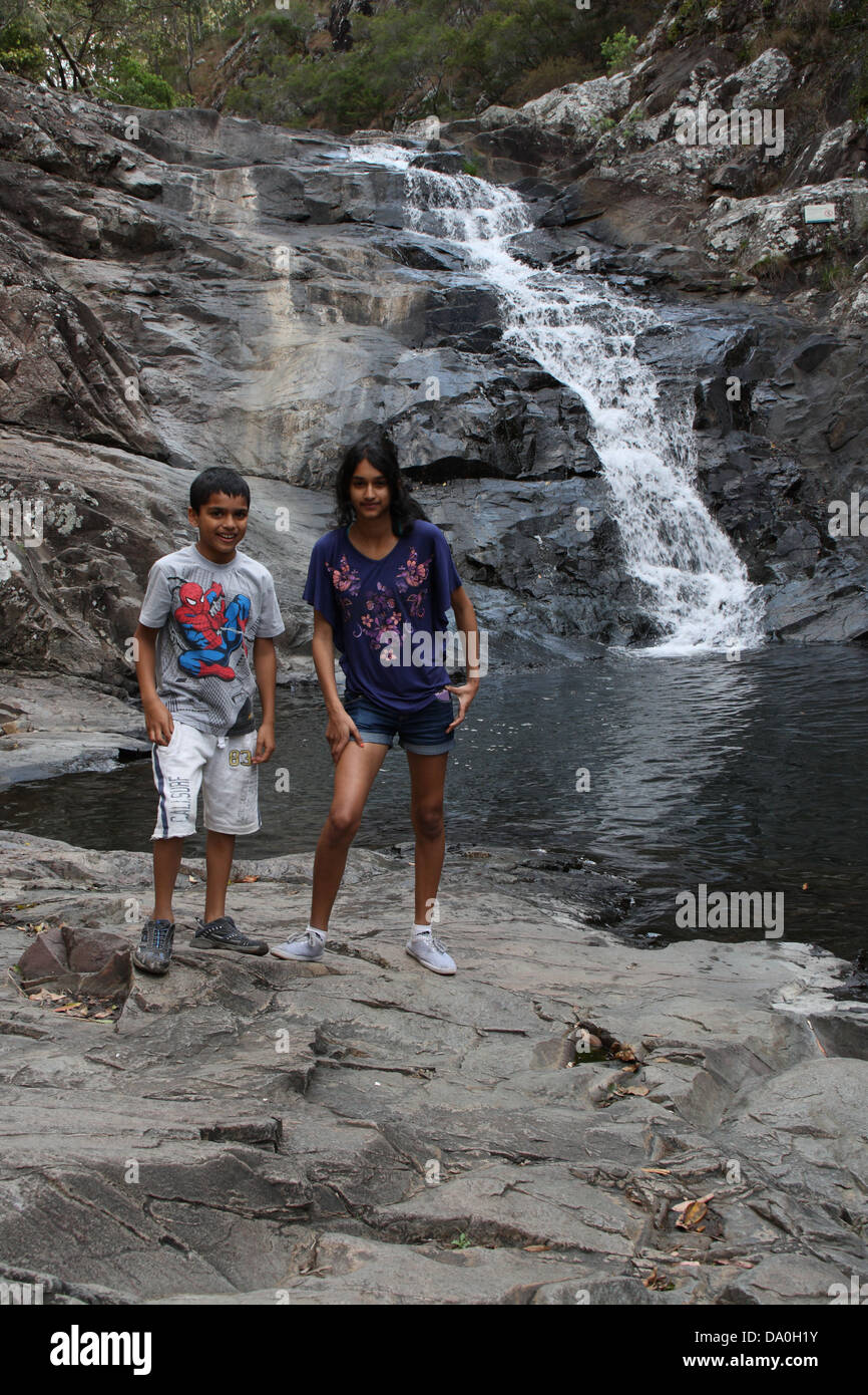 Boy and Girl Waterfall Stock Photo - Alamy