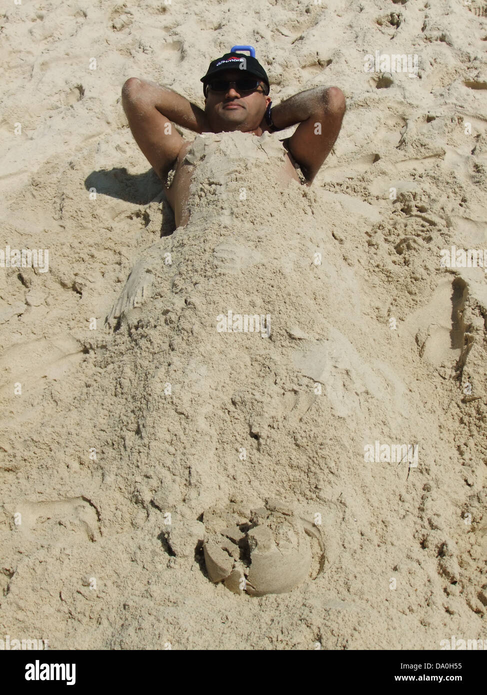 Covered in sand Stock Photo - Alamy
