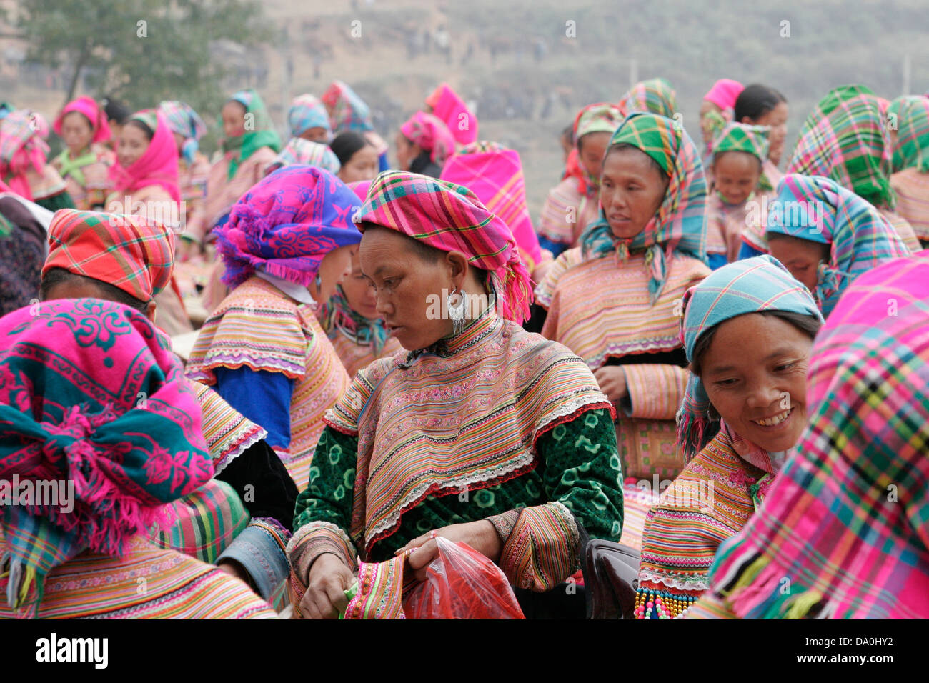 Colorfully dressed Flower Hmong women at the market in Bac Ha, Vietnam ...