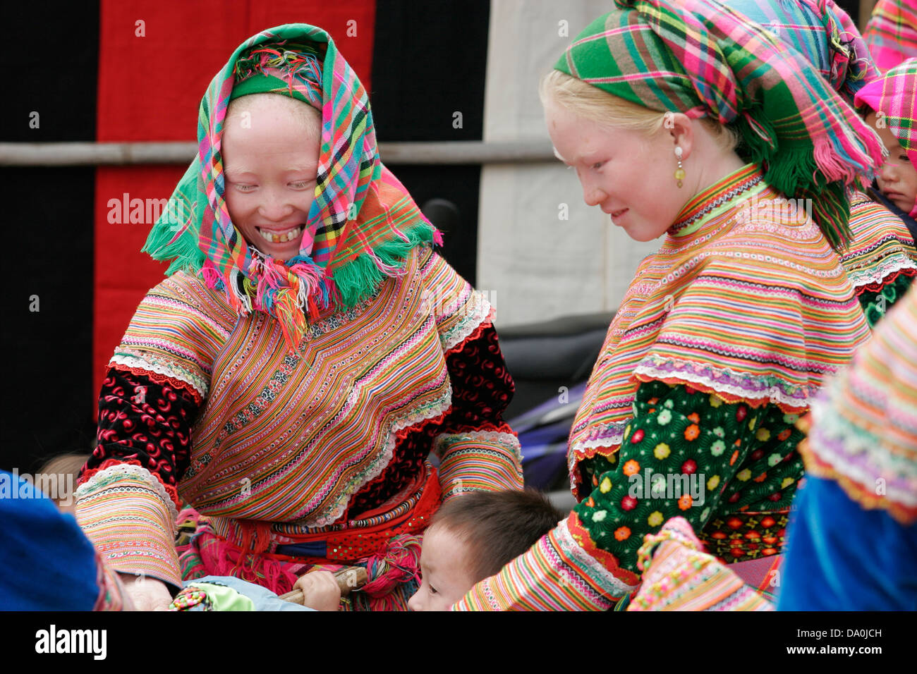 Colorfully dressed Flower Hmong women at the market in Bac Ha, Vietnam ...