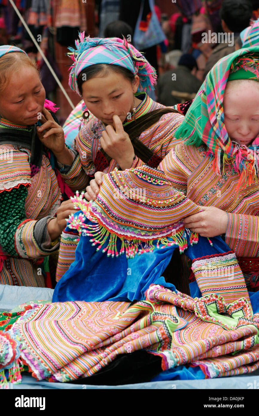 Colorfully dressed Flower Hmong women at the market in Bac Ha, Vietnam ...