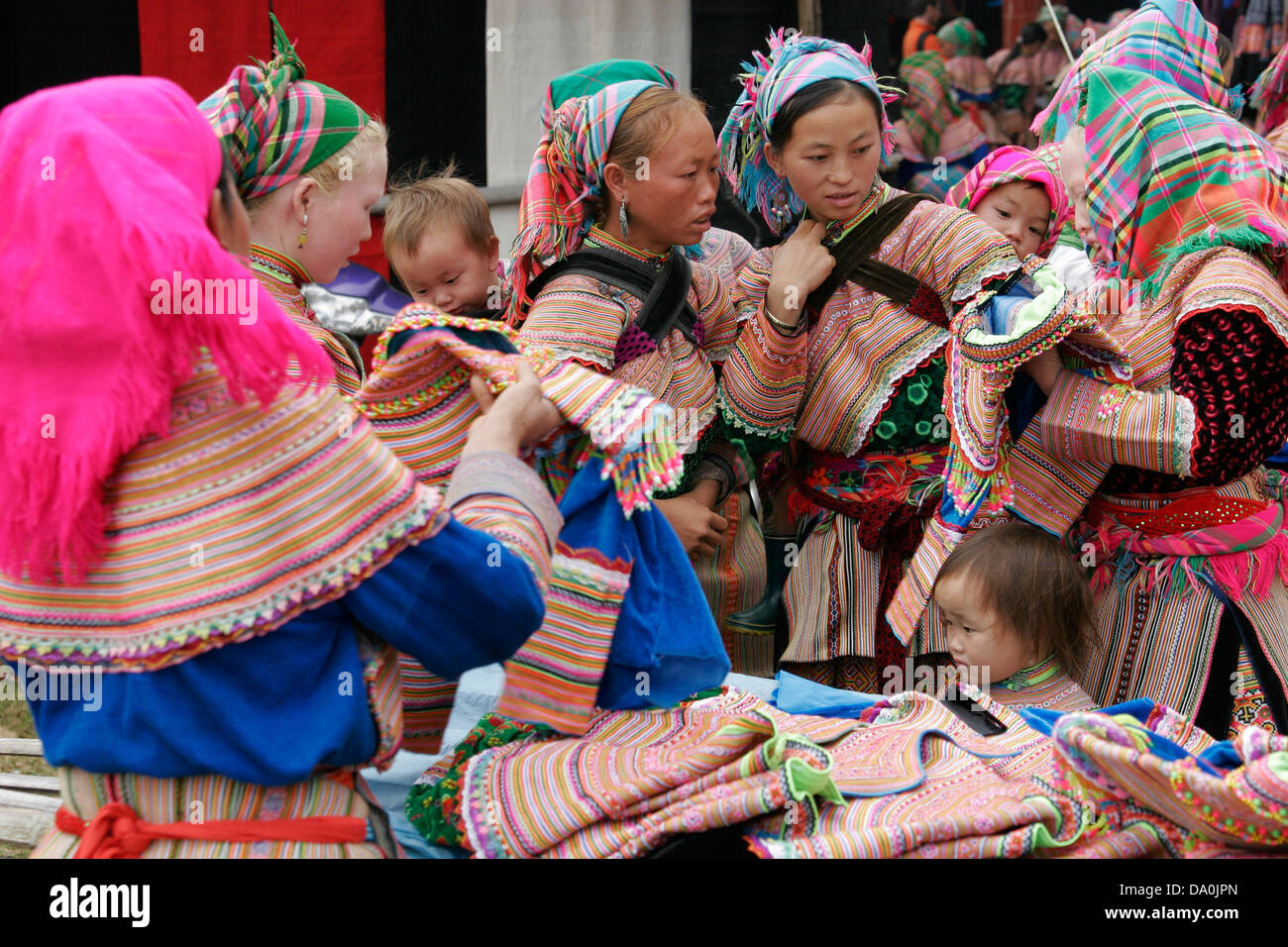Colorfully dressed Flower Hmong women at the market in Bac Ha, Vietnam ...
