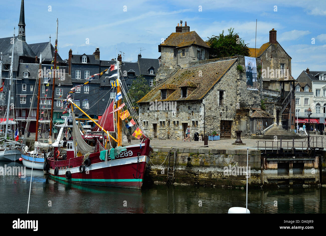 Old fishing boat in the old port (Vieux Bassin), in front of The ...