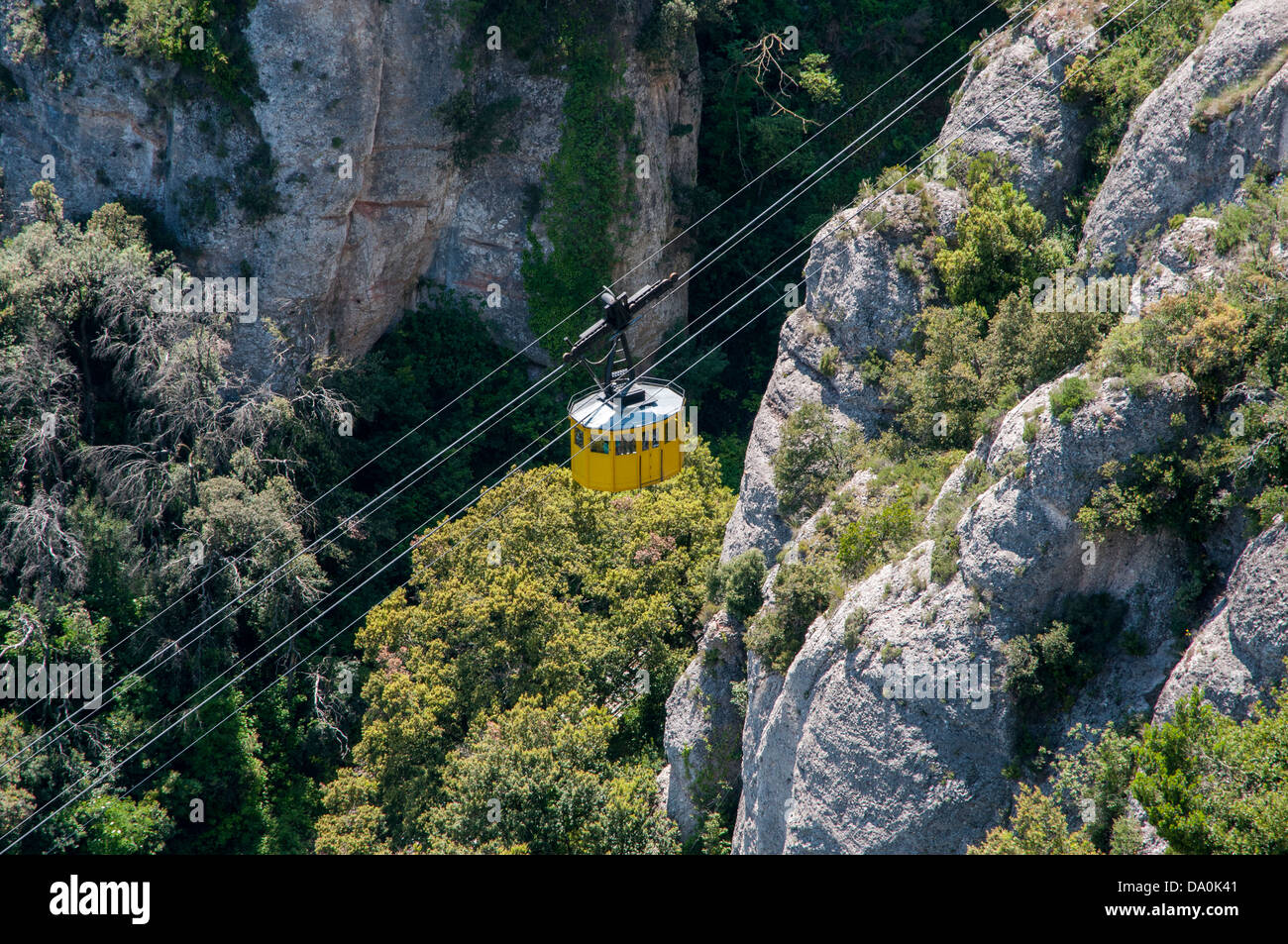 yellow cable car up the mountain Stock Photo - Alamy
