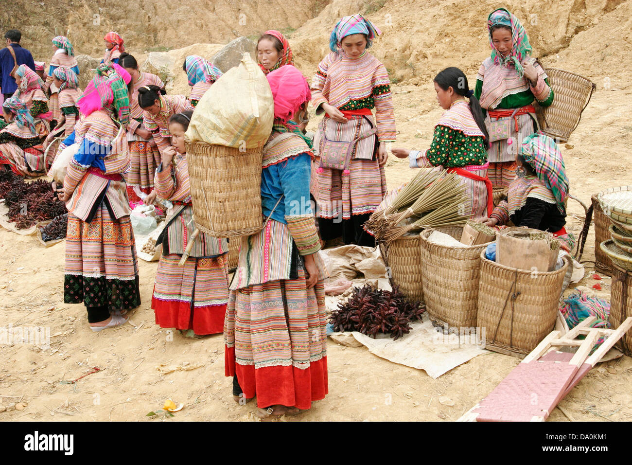 Colorfully dressed Flower Hmong women at the market in Bac Ha, Vietnam ...