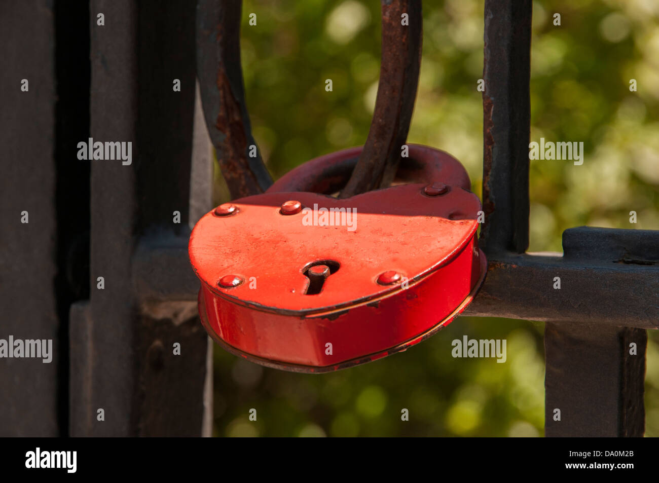 clutching red lock a door Stock Photo - Alamy