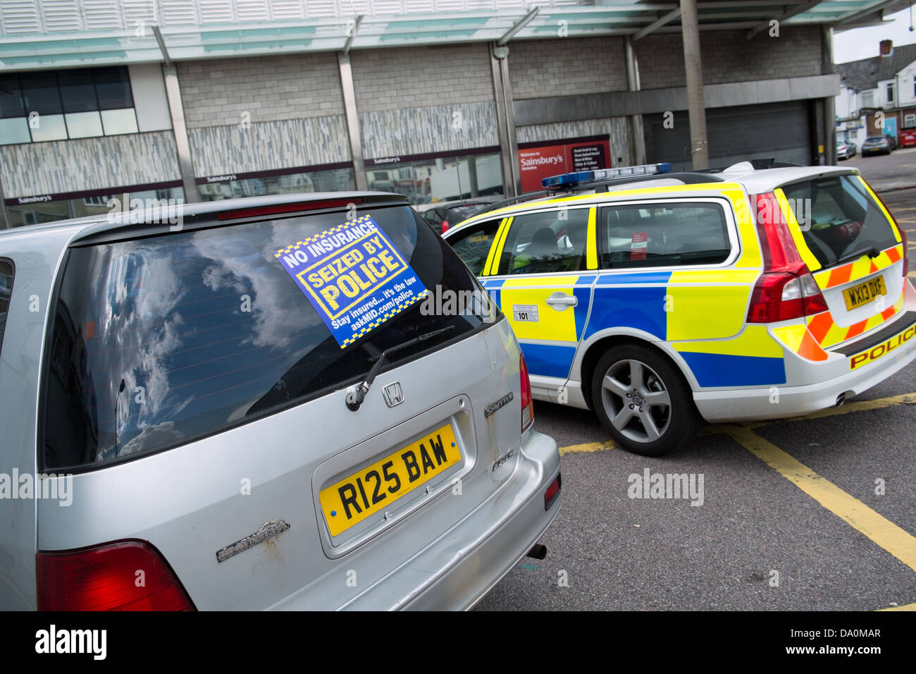 A sticker on a car in the UK, seized by the police for being uninsured ...