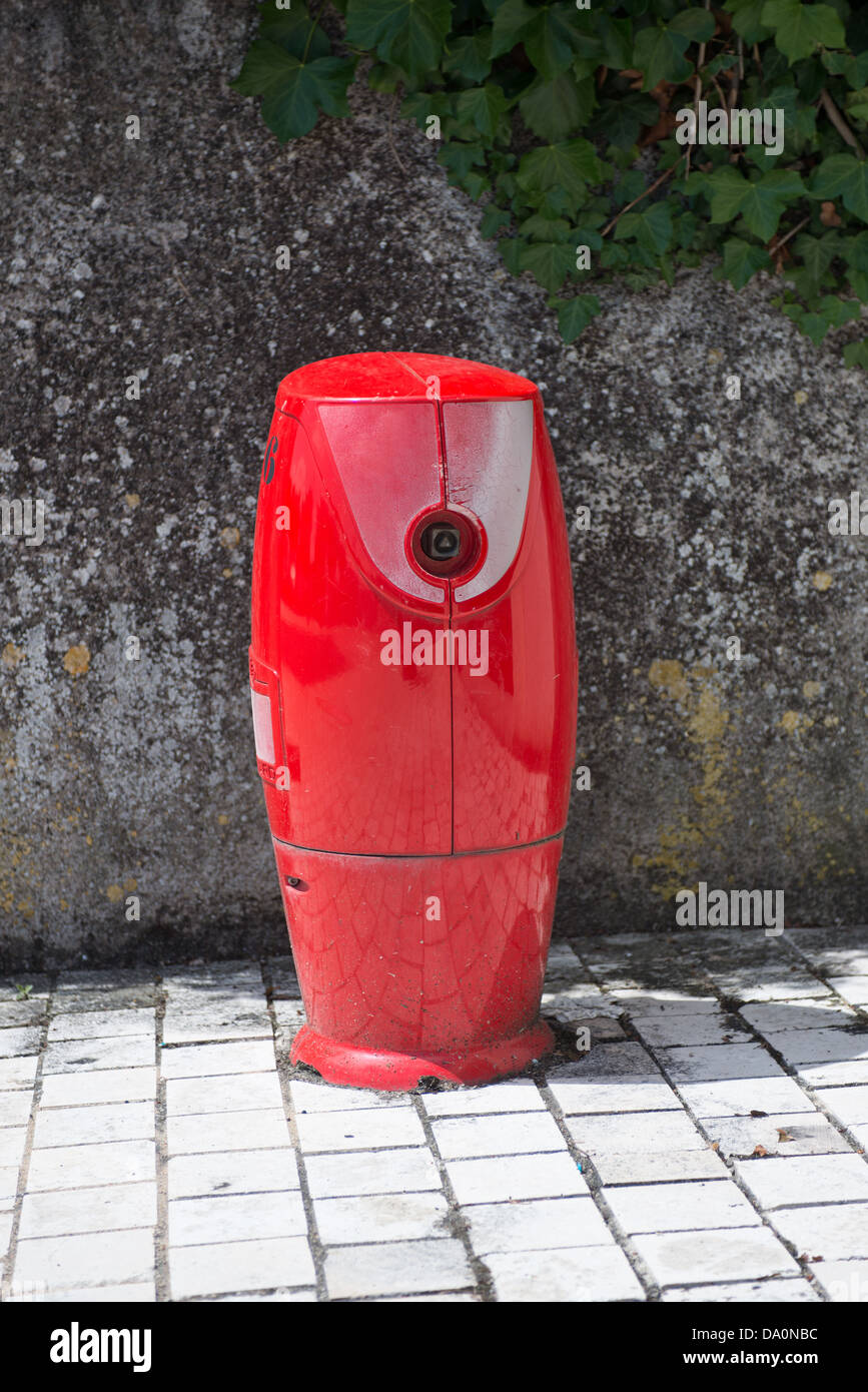 A typical modern red French fire hydrant on a street in France Stock ...