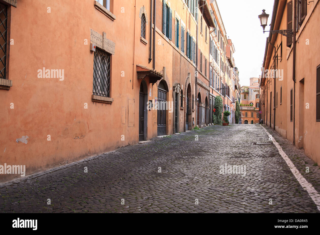 A picturesque cobbled side street in Rome, Italy Stock Photo - Alamy