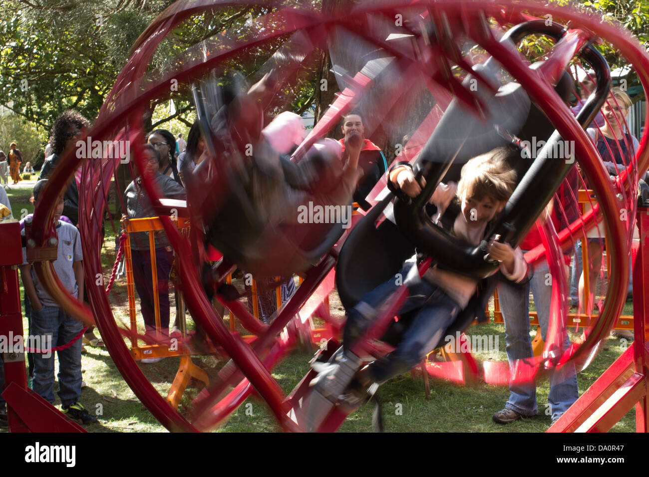 Children enjoy tumble ride Stock Photo - Alamy