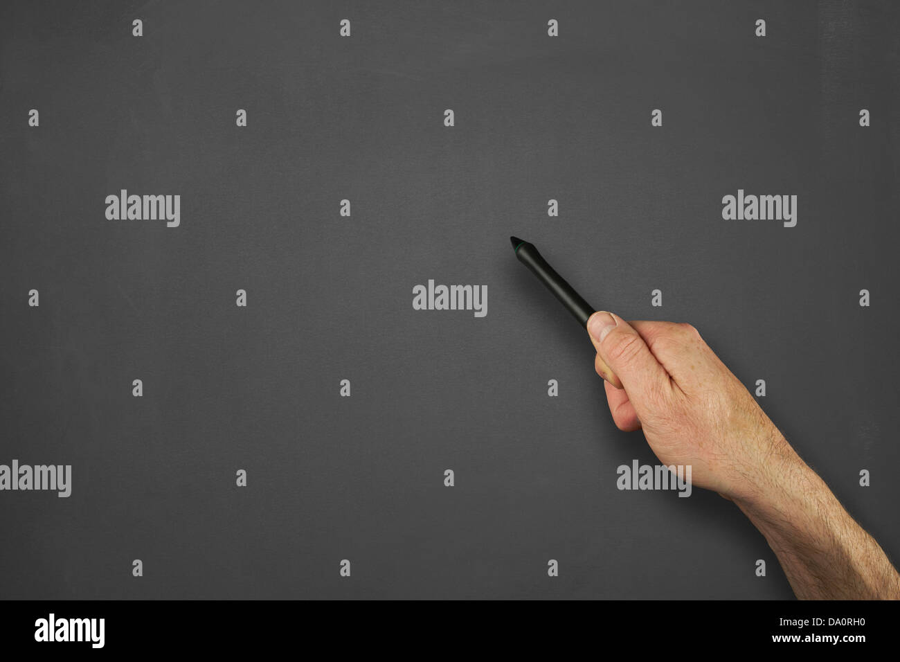 Mans hand pointing to a blank message on a chalkboard Stock Photo - Alamy