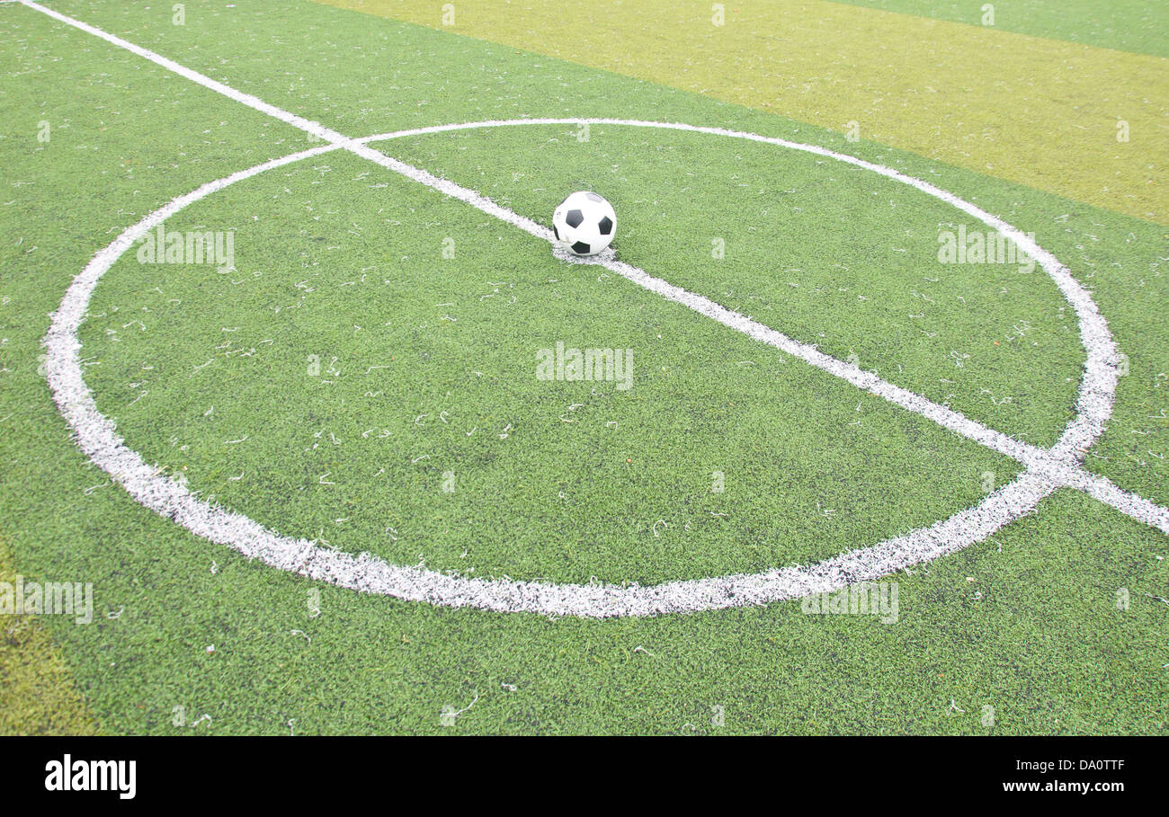 black and white ball on center line for play Stock Photo - Alamy