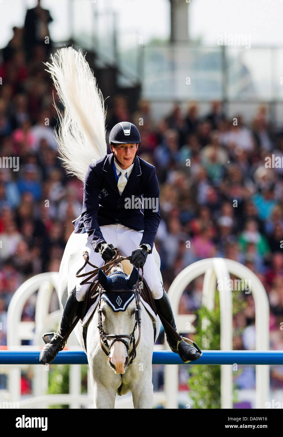 German dressage rider Daniel Deusser on his horse Cornet d'Amour in ...