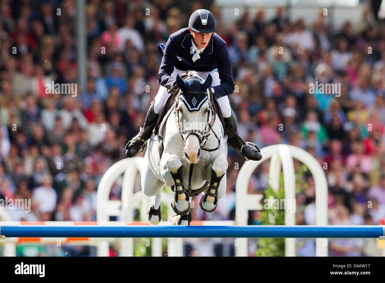 German dressage rider Daniel Deusser on his horse Cornet d'Amour in ...