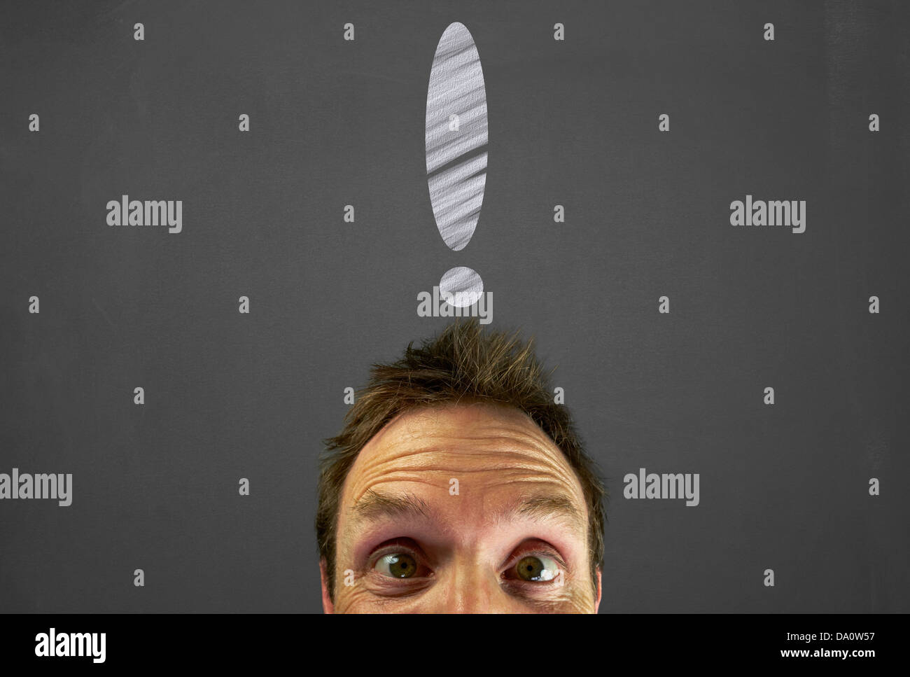 Mans head with chalk exclamation mark on a blackboard Stock Photo - Alamy