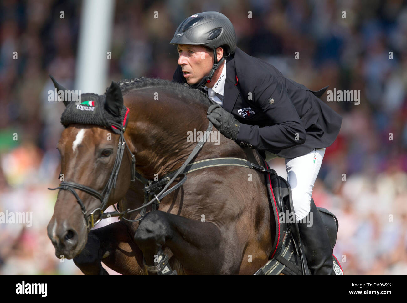 German show jumper Hans-Dieter Dreher on his horse Magnus Romeo in ...