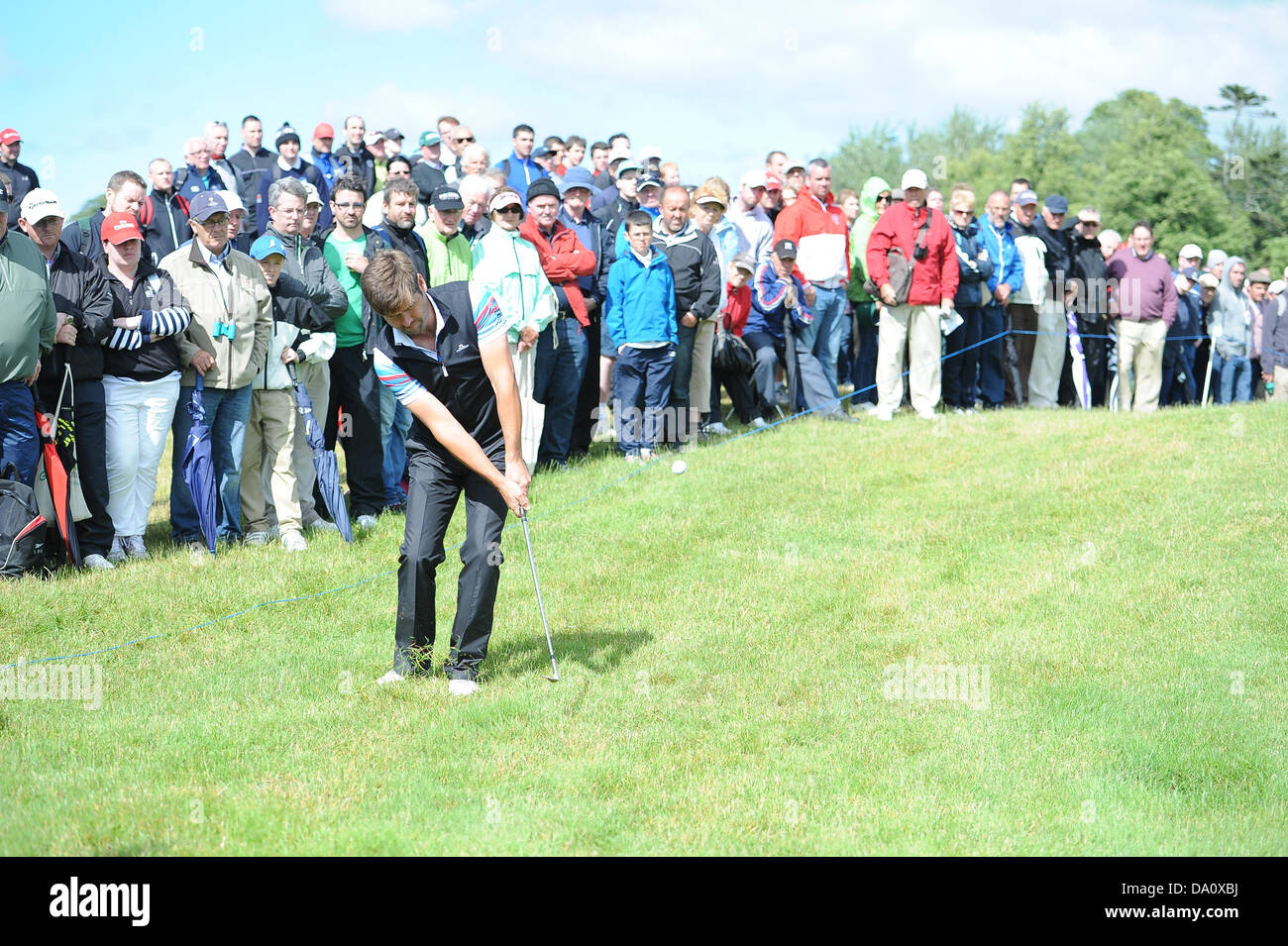Maynooth, Ireland. 30th June, 2013. Robert Rock chips to the green ...