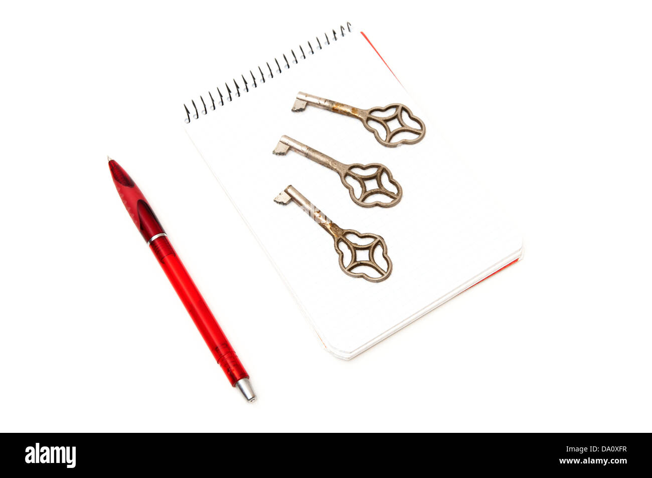 notepad with keys on a white background Stock Photo - Alamy