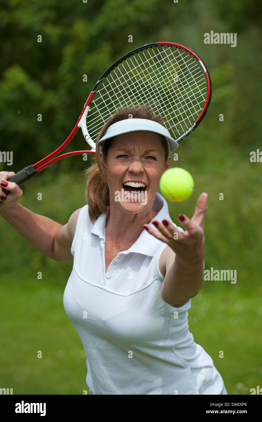 Woman playing tennis Stock Photo - Alamy