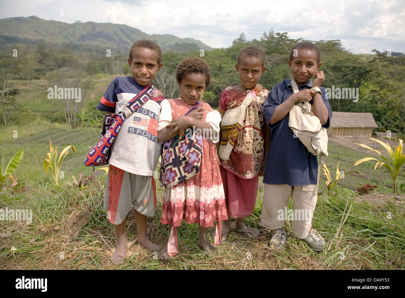 Youngsters Await A School Bus In Rural Lufa District Of The Eastern Highlands Province Near