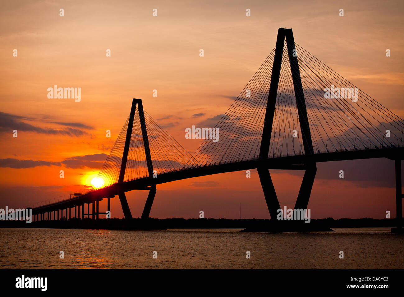 Sunset over the Arthur Ravenel Jr. bridge in Charleston, SC Stock Photo ...