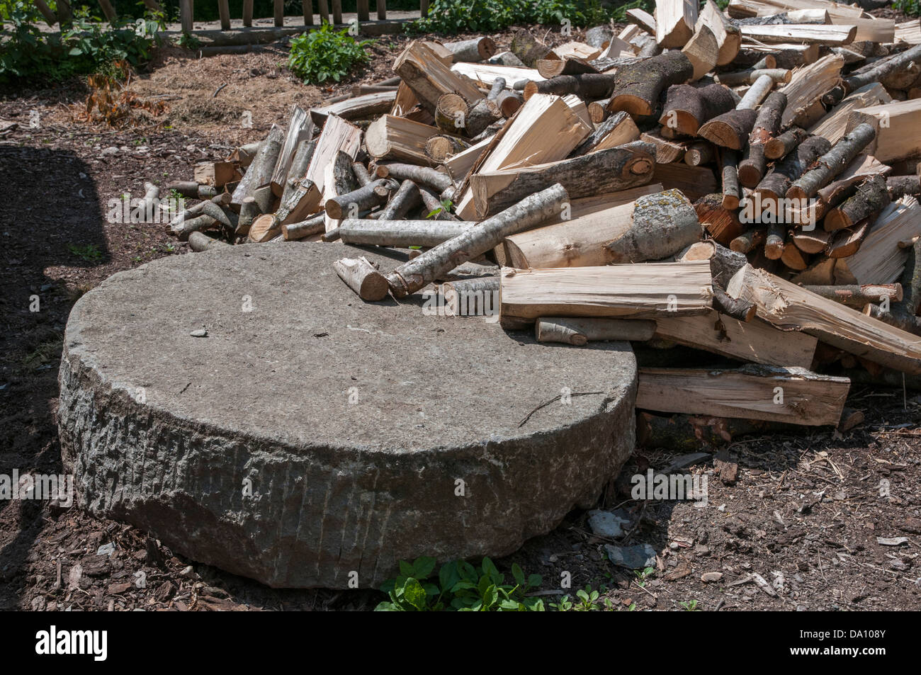 stone cutting logs Stock Photo - Alamy