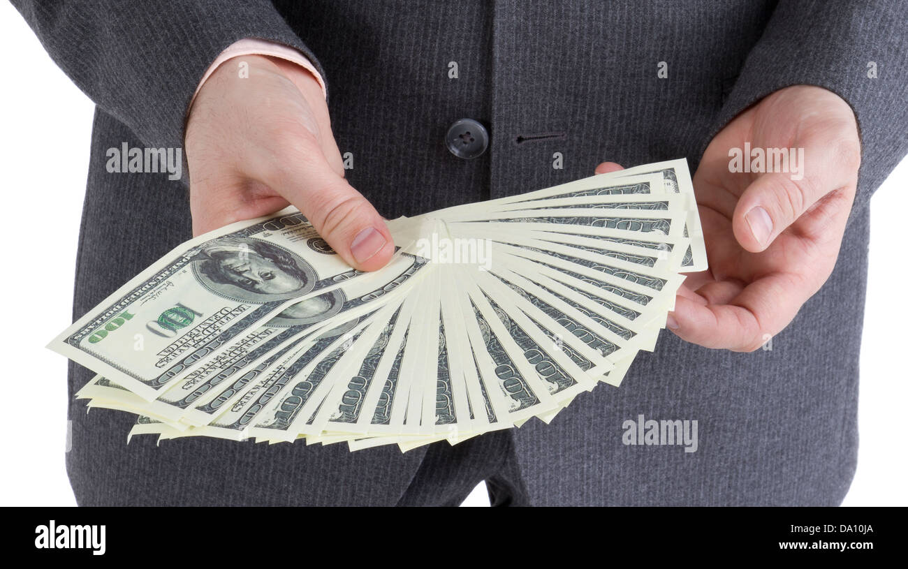 stack banknotes of 100 dollars in male hands on a white background ...