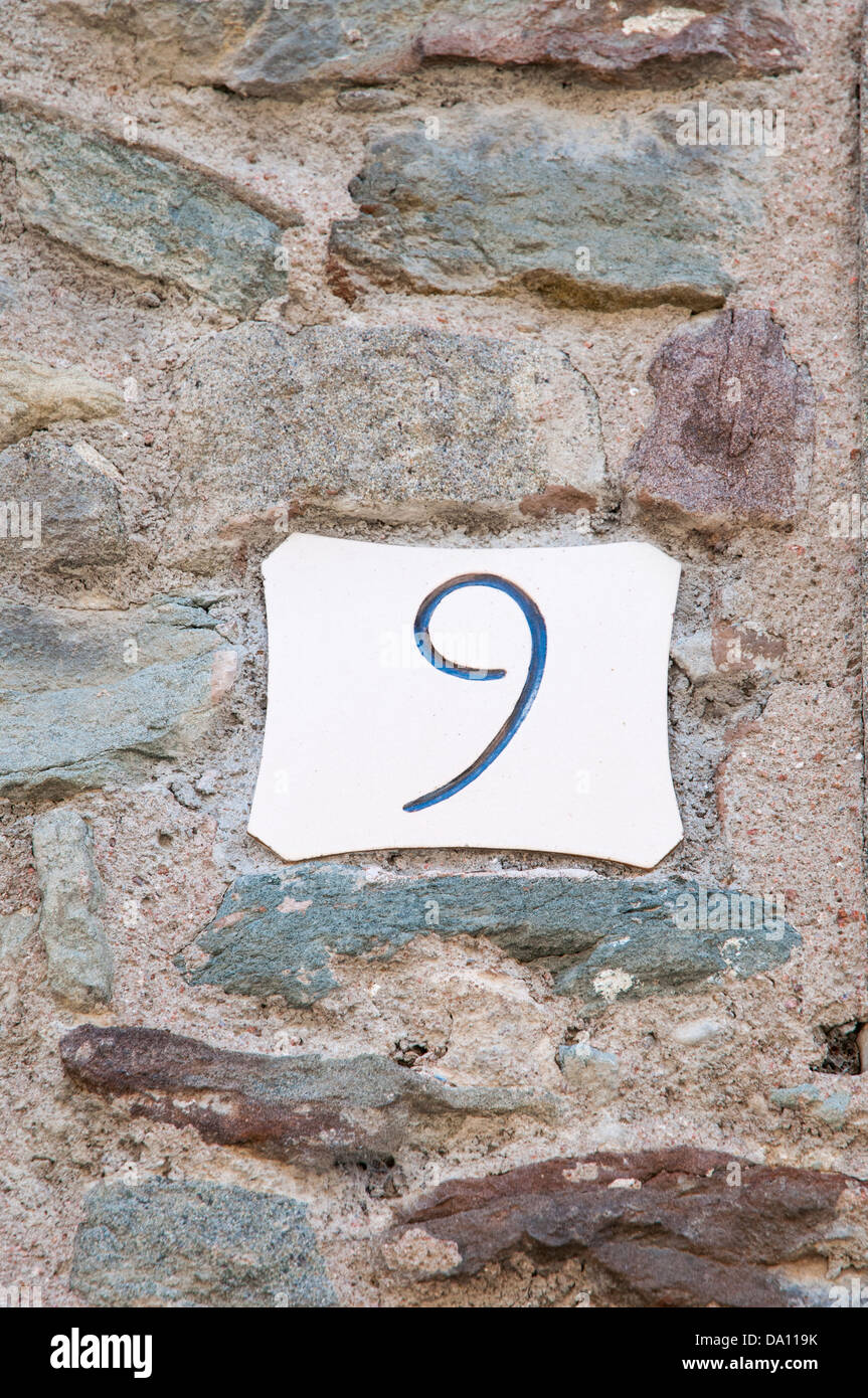 number 9 with stone wall Stock Photo - Alamy