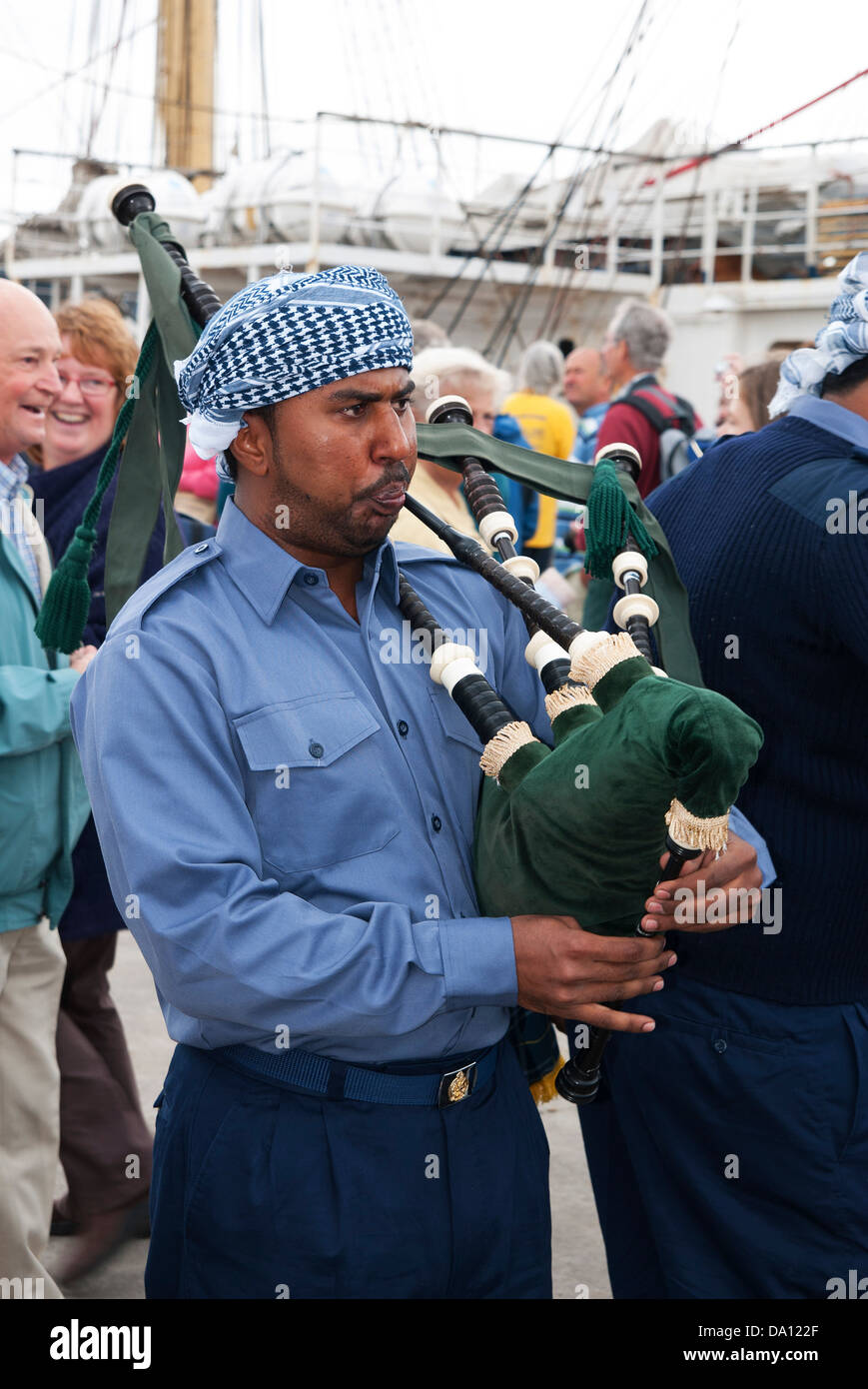 a sailor from the navy of Oman playing the bagpipes at falmouth in ...