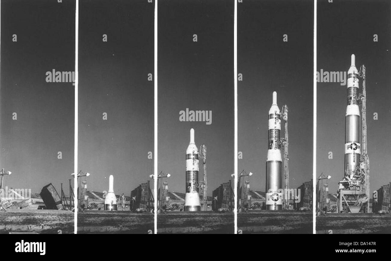 The Titan I missile emerges from its silo at the Vandenberg Operational ...