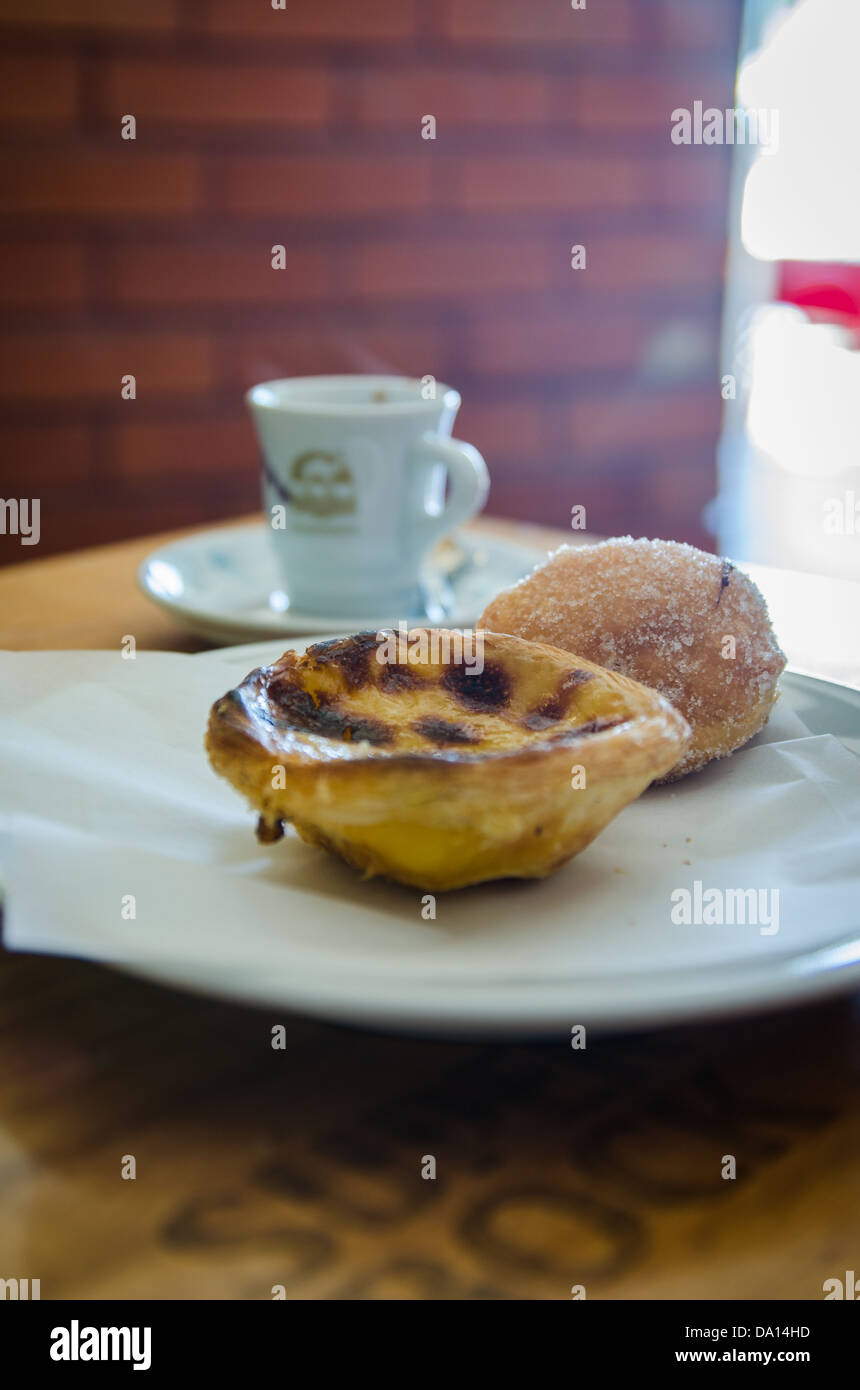 Pastel de nata or pasteis de nata in a Potuguese cafe Stock Photo - Alamy