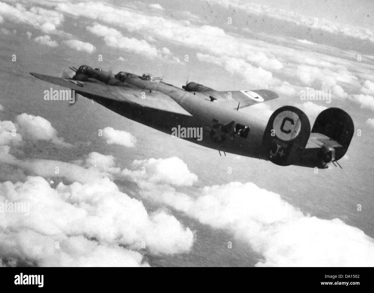 A B-24 Liberator bomber from the 566th Bombardment Squadron, part of ...