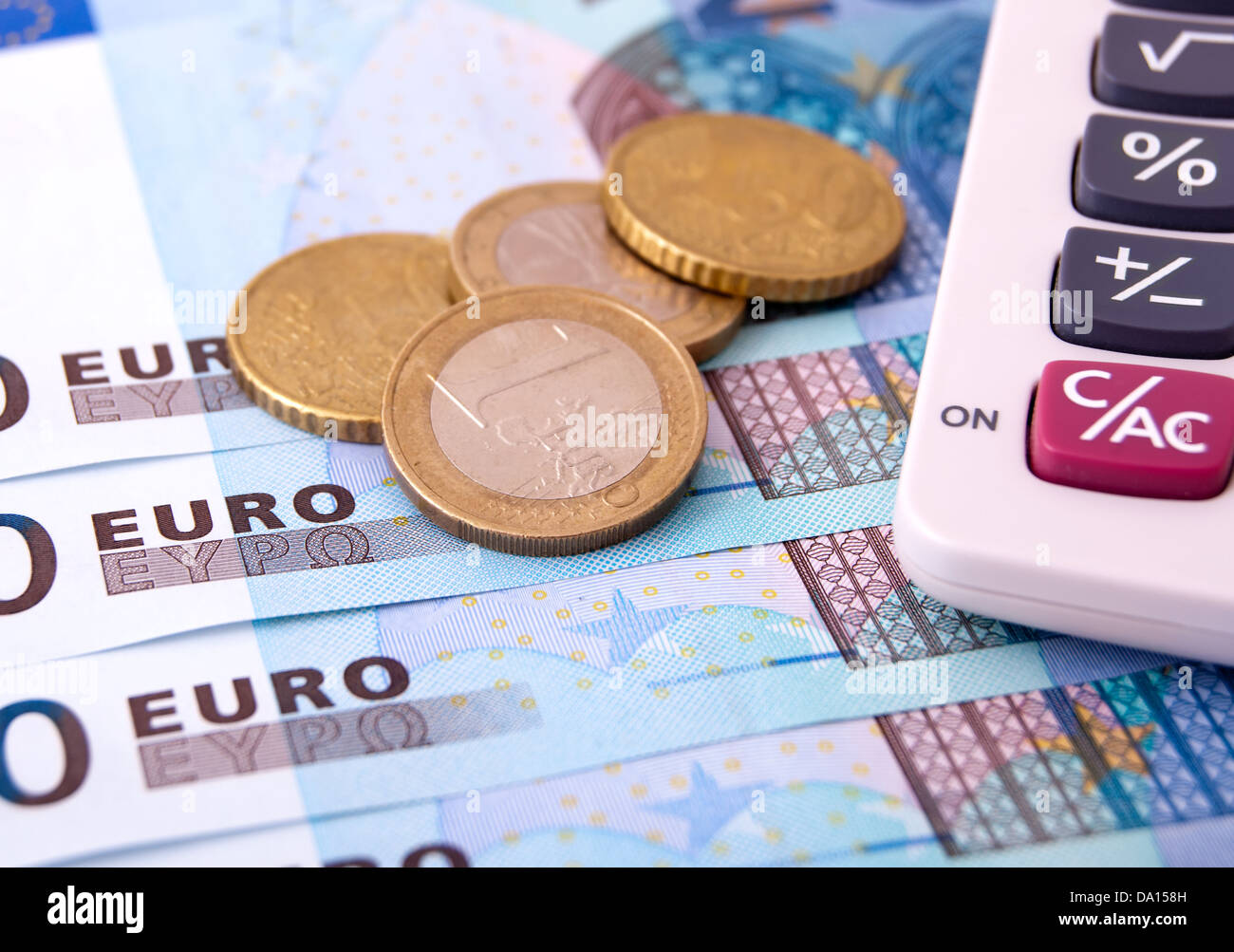 Euro Coins Notes and Calculator Stock Photo - Alamy