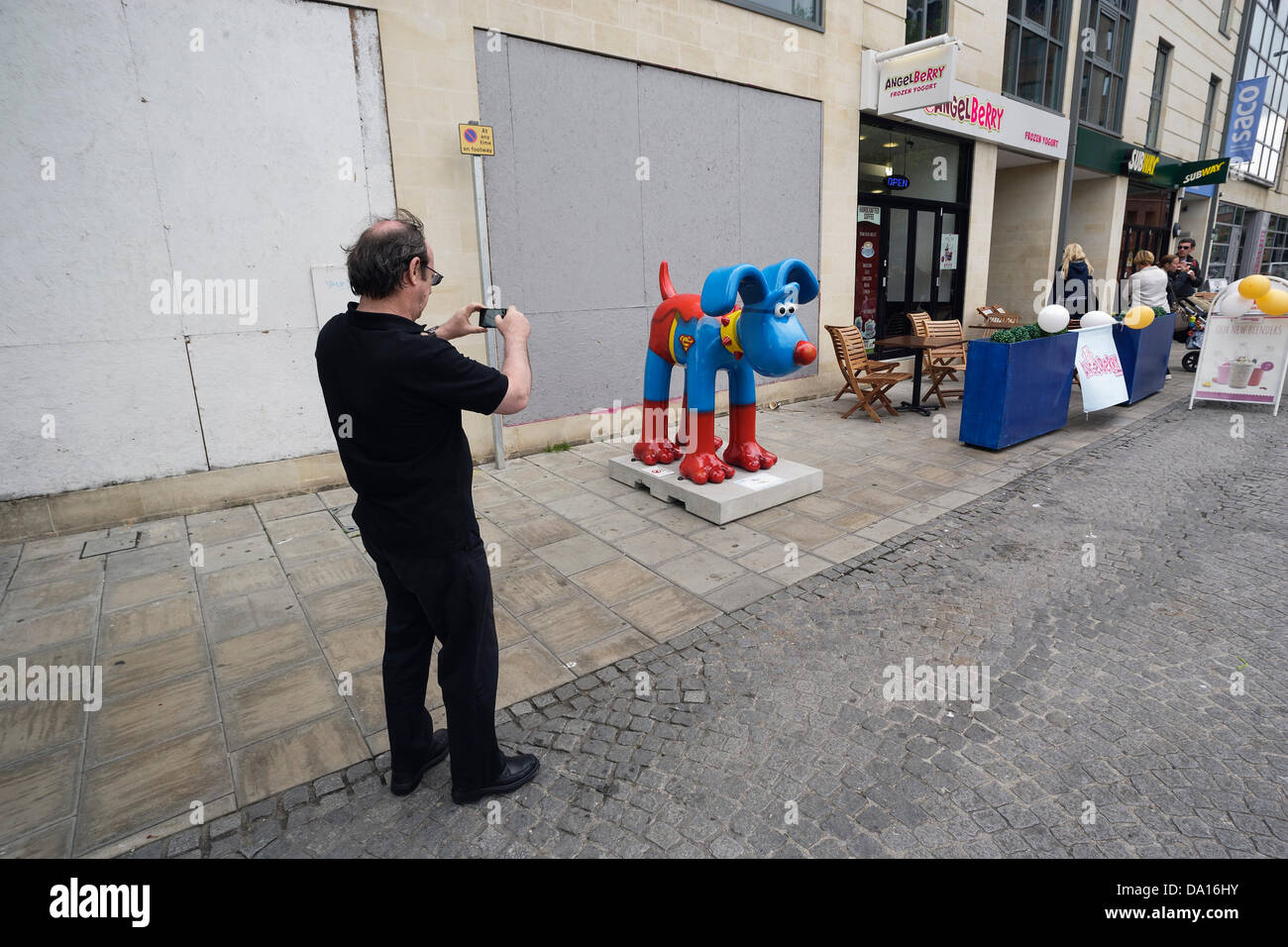 Bristol, UK. 30th June 2013. A man takes a photograph of the Hero ...
